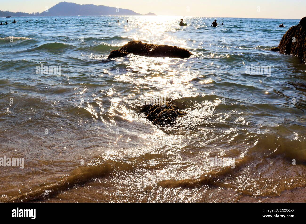 Heat at sea, waves glisten in the sun, beach vacation Stock Photo - Alamy