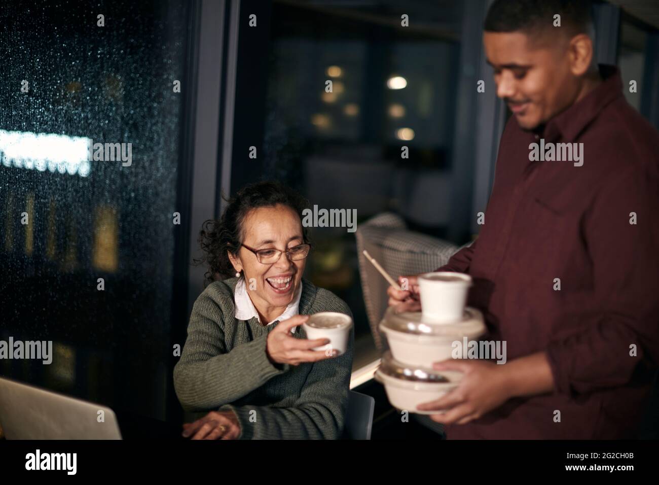 Coworkers having take away Stock Photo - Alamy