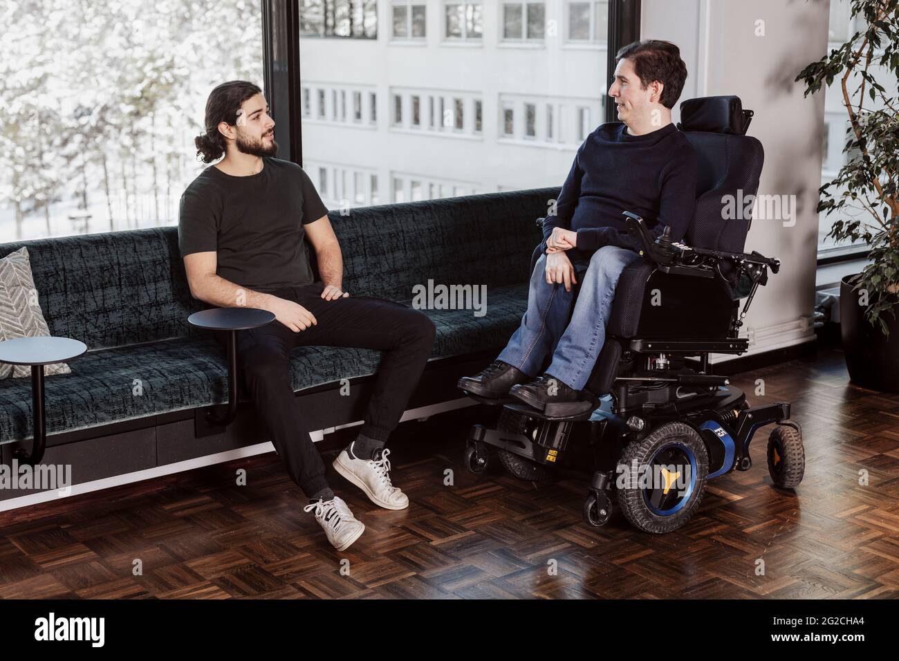 Men talking together Stock Photo - Alamy