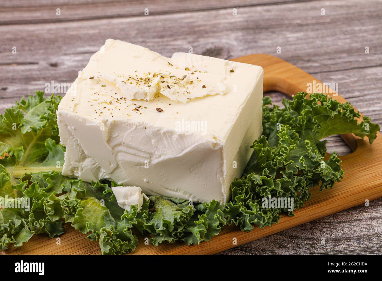 Traditional tasty Greek Feta soft cheese brick Stock Photo - Alamy