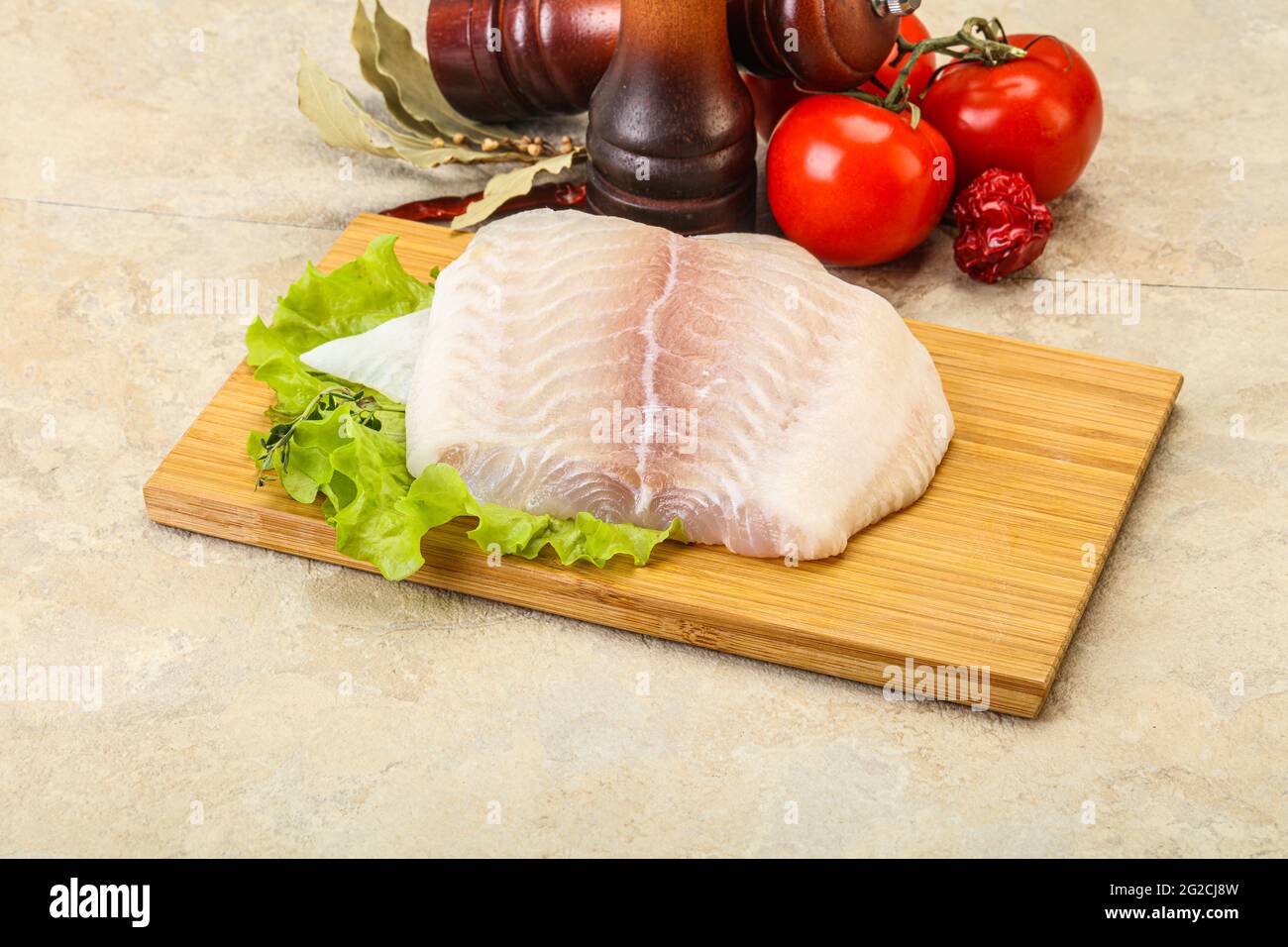 Raw pangasius fillet fish for cooking Stock Photo - Alamy