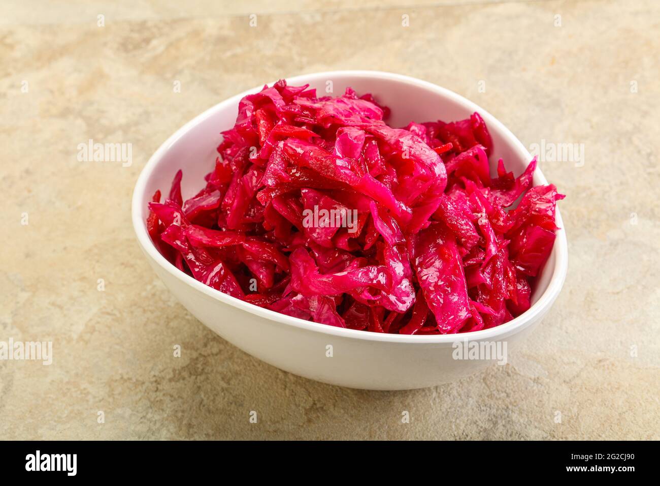 Marinated red cabbage with beetroot in the bowl Stock Photo - Alamy