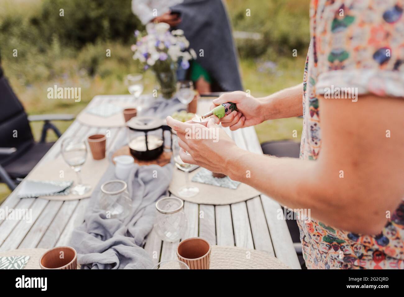 Preparing dinner party hi-res stock photography and images - Alamy