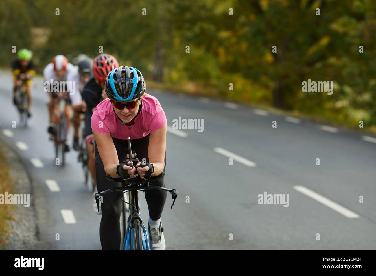 Team of cyclists on road hi-res stock photography and images - Alamy