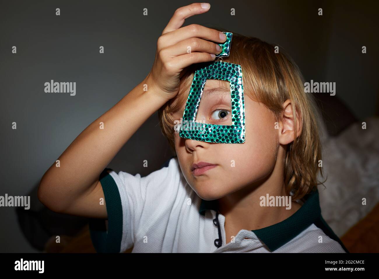 Boy looking at camera Stock Photo - Alamy