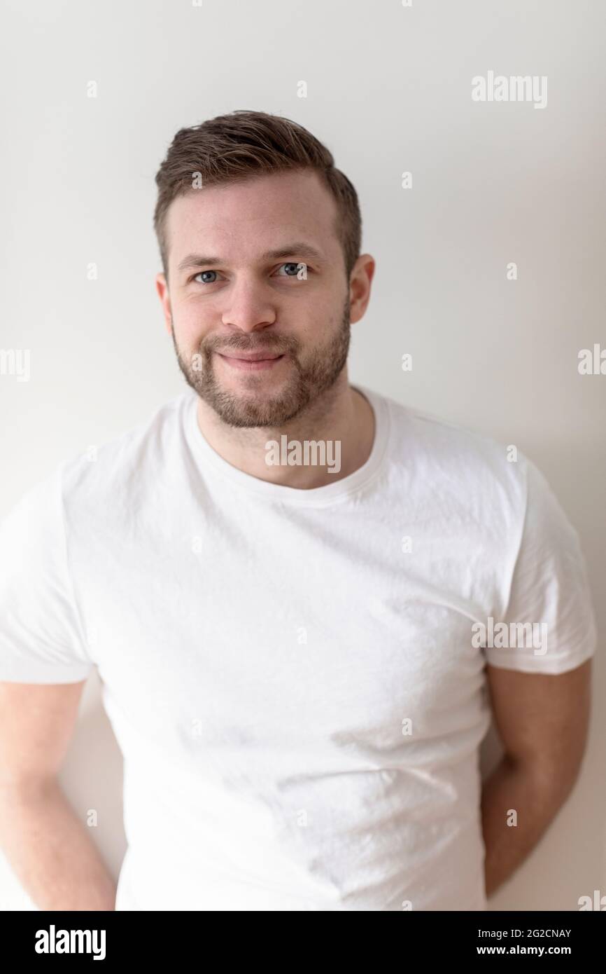 Positive looking man vertical hi-res stock photography and images - Alamy