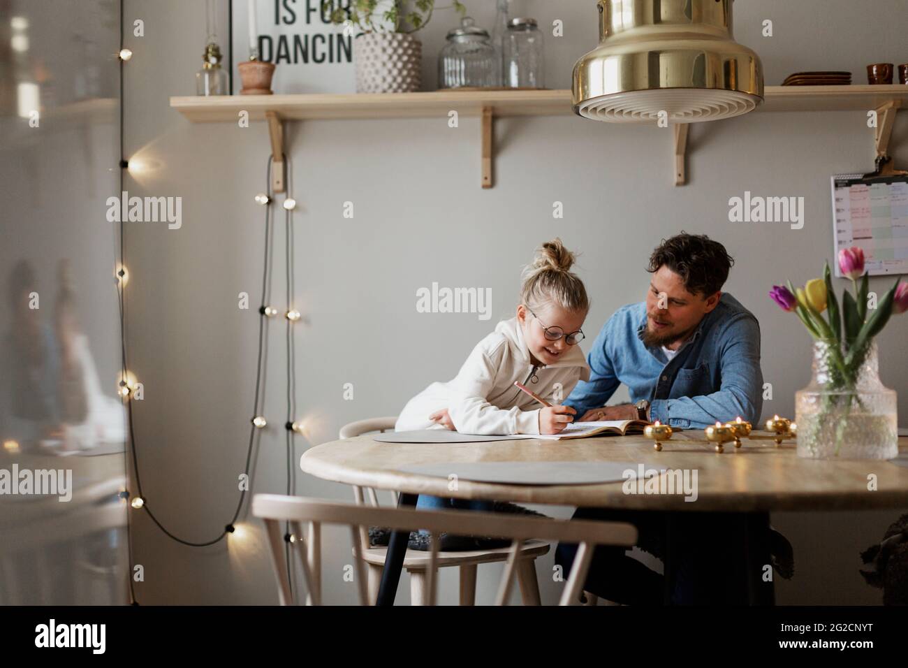 Parent child homework lamp hi-res stock photography and images - Alamy