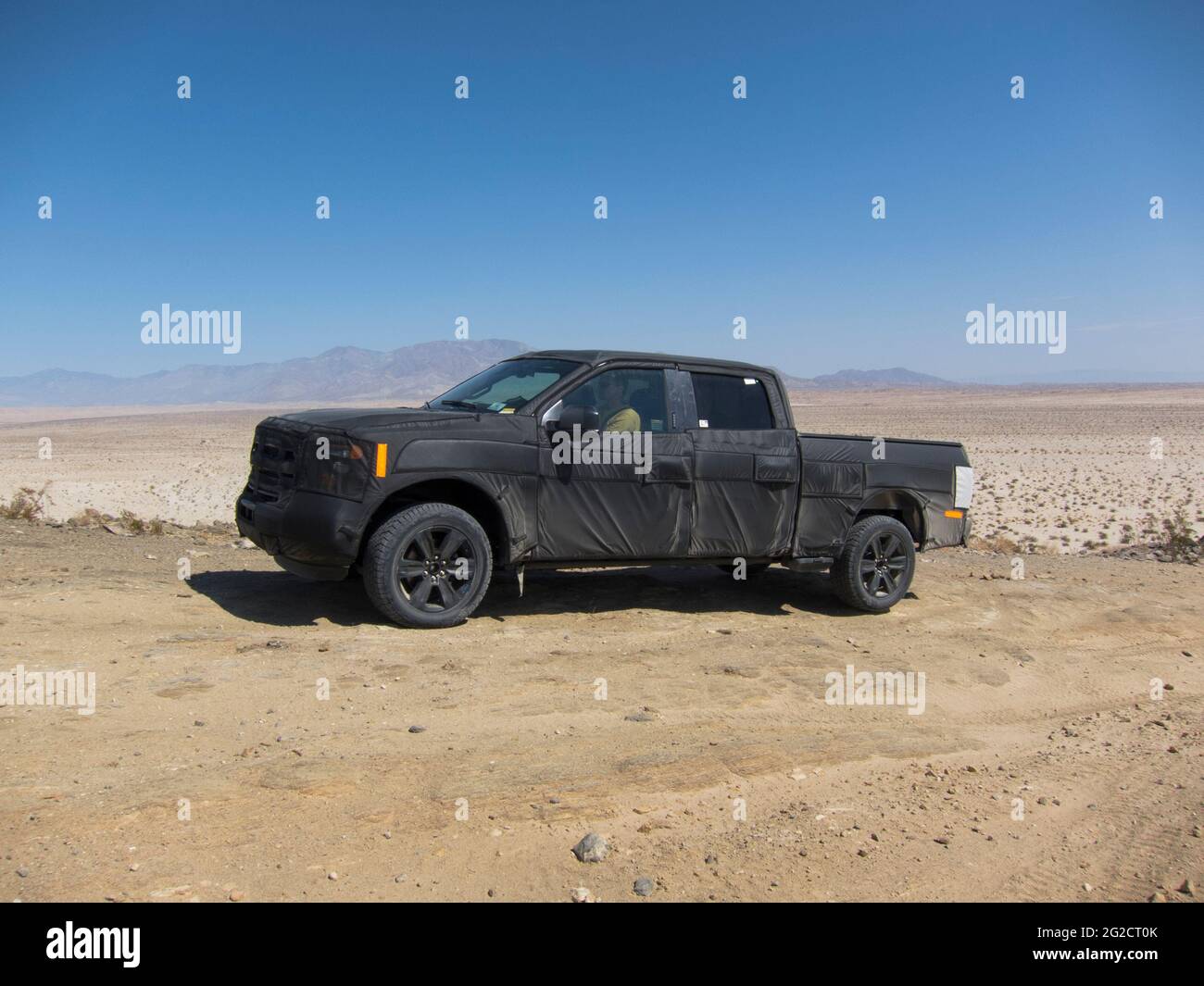 A camouflaged, covered up, disguised prototype Ford F-150 2014 pickup ...