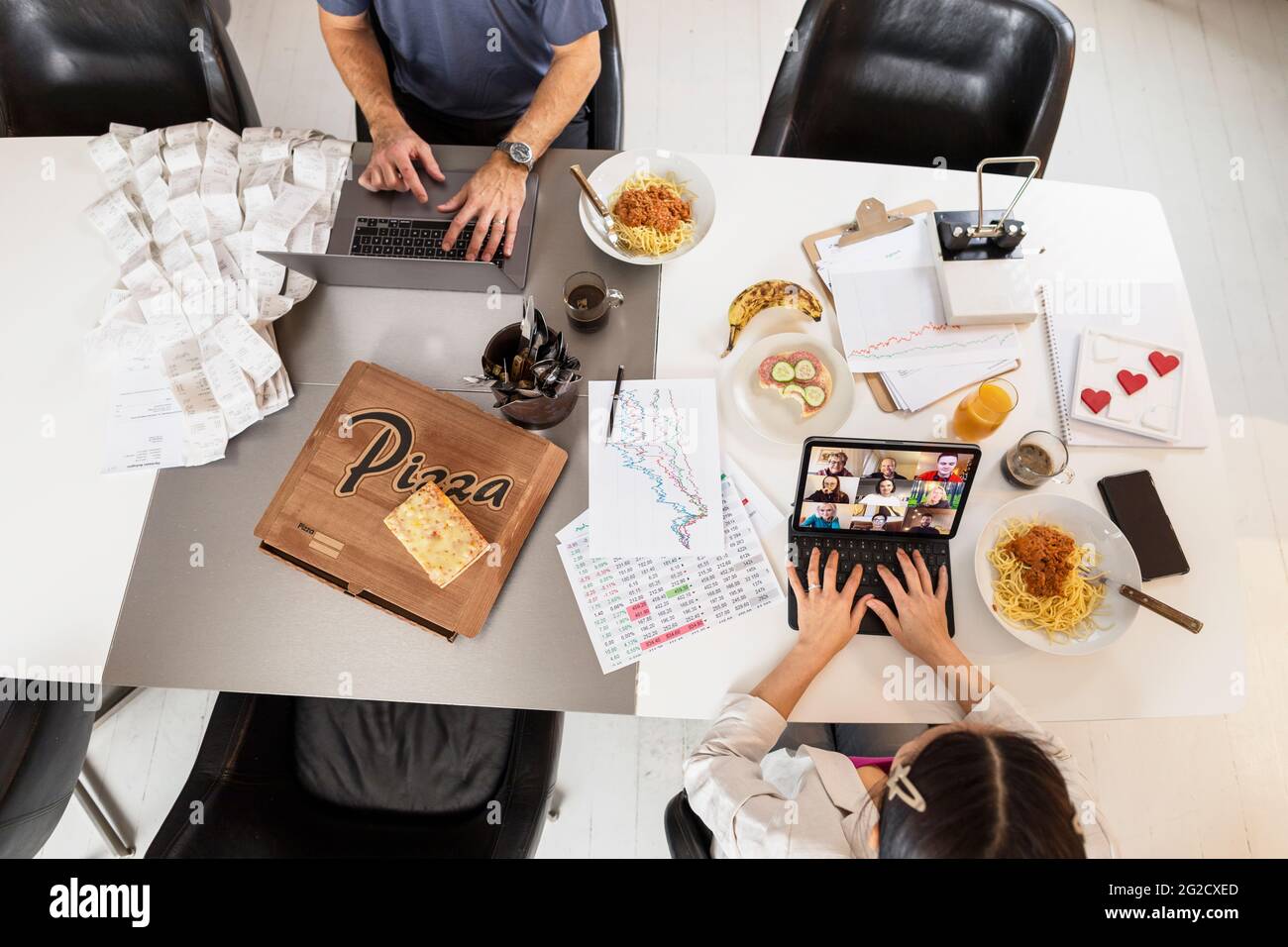 Food and laptops on table Stock Photo - Alamy