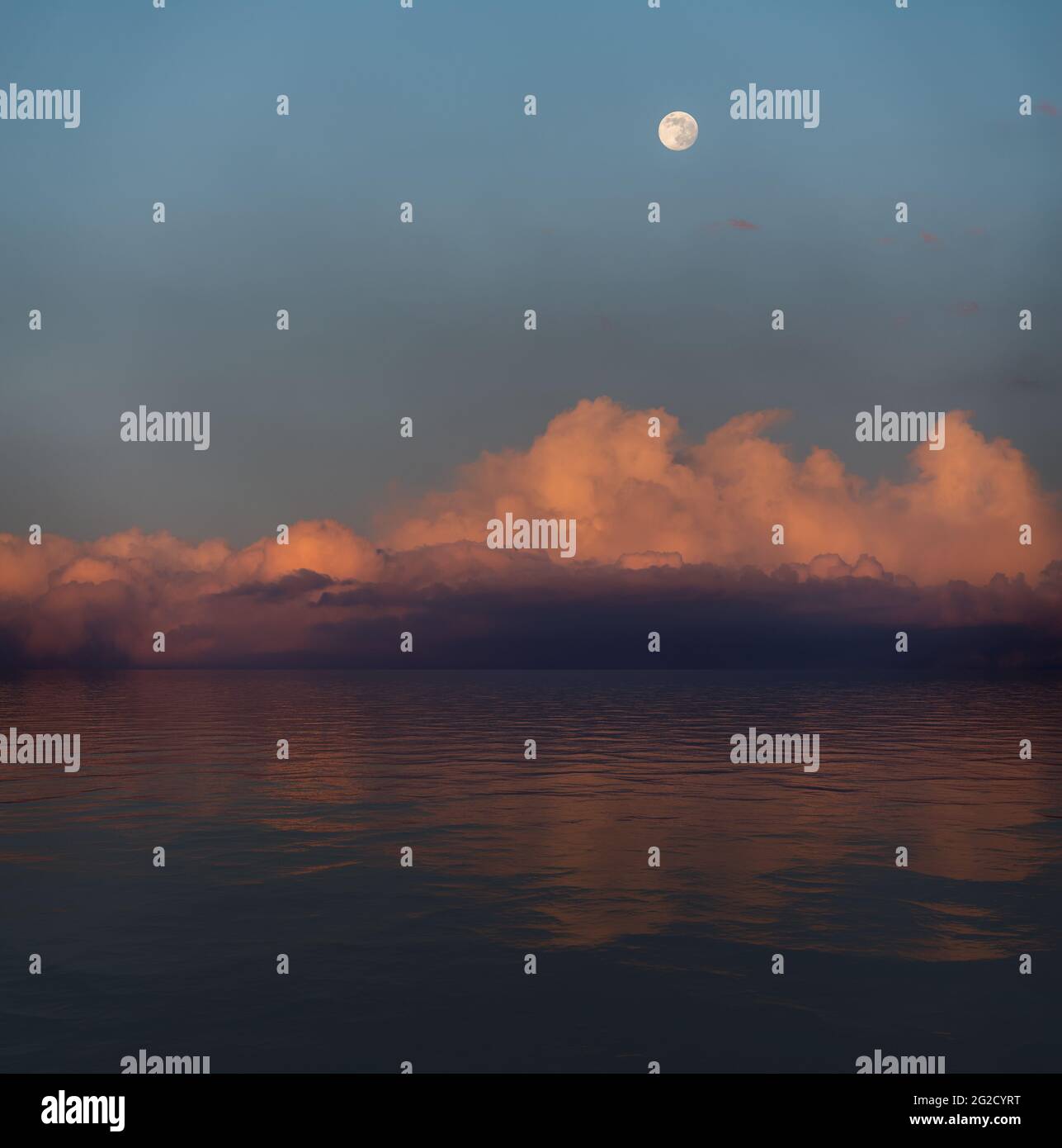 Moon with sunset sky reflected in water surface Stock Photo - Alamy
