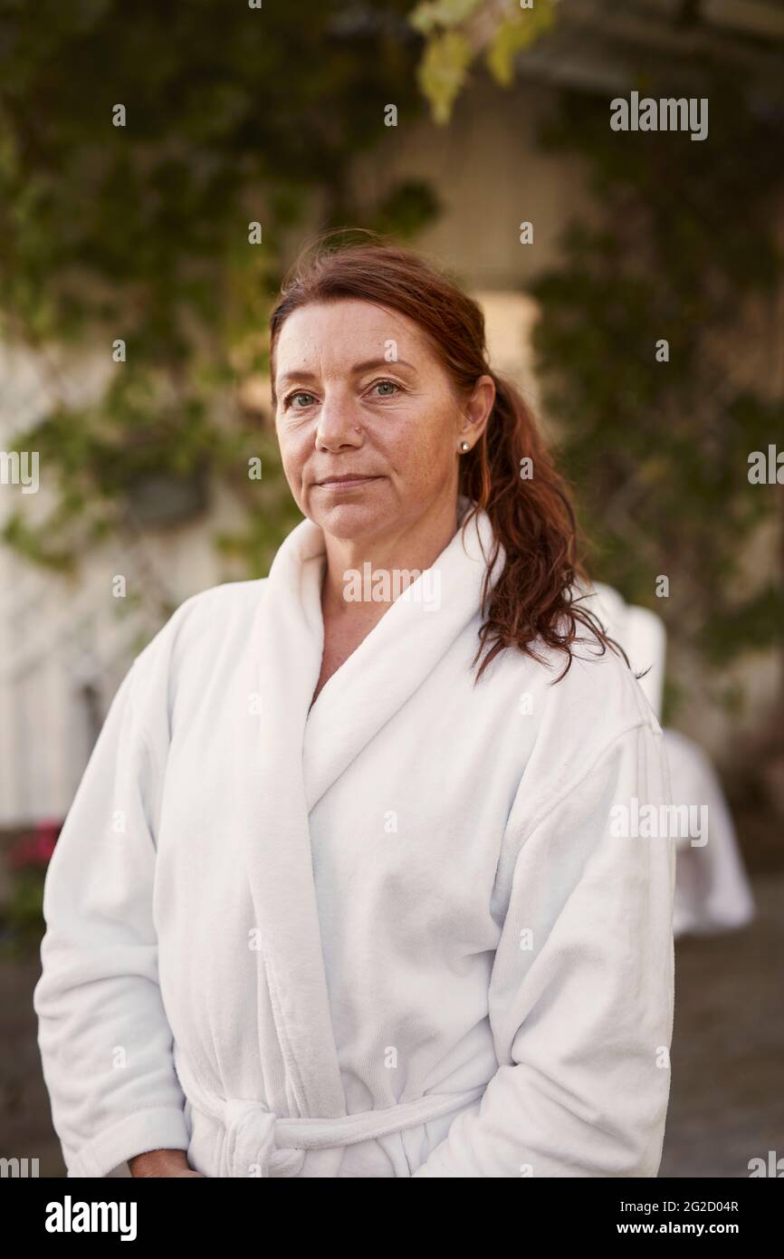 Woman wearing dressing gown in garden Stock Photo - Alamy Woman wearing dressing gown in garden Stock Photo - Alamy