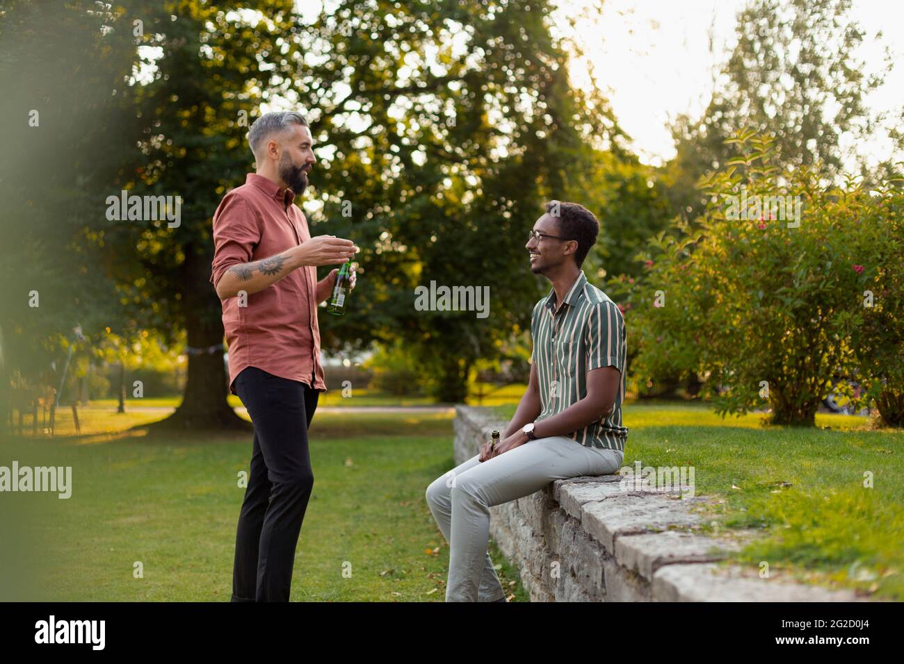 Two men talking in house hi-res stock photography and images - Alamy