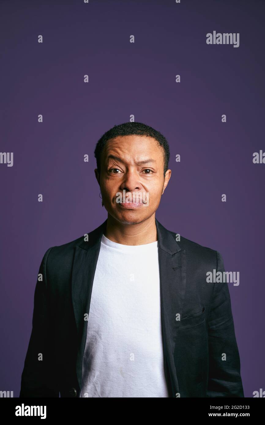 Man looking at camera Stock Photo - Alamy