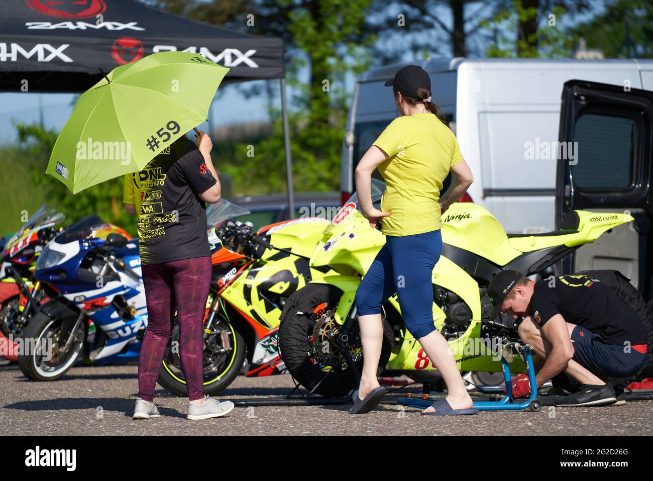 Three people riding a motorcycle hi-res stock photography and images ...