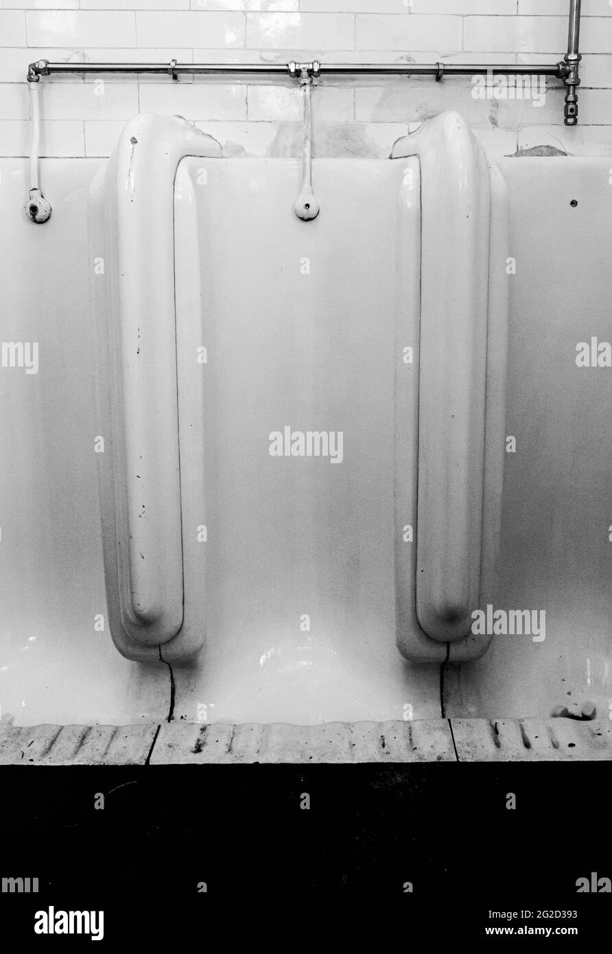 Vintage 1940s style mens urinals at a former World War II airforce base ...