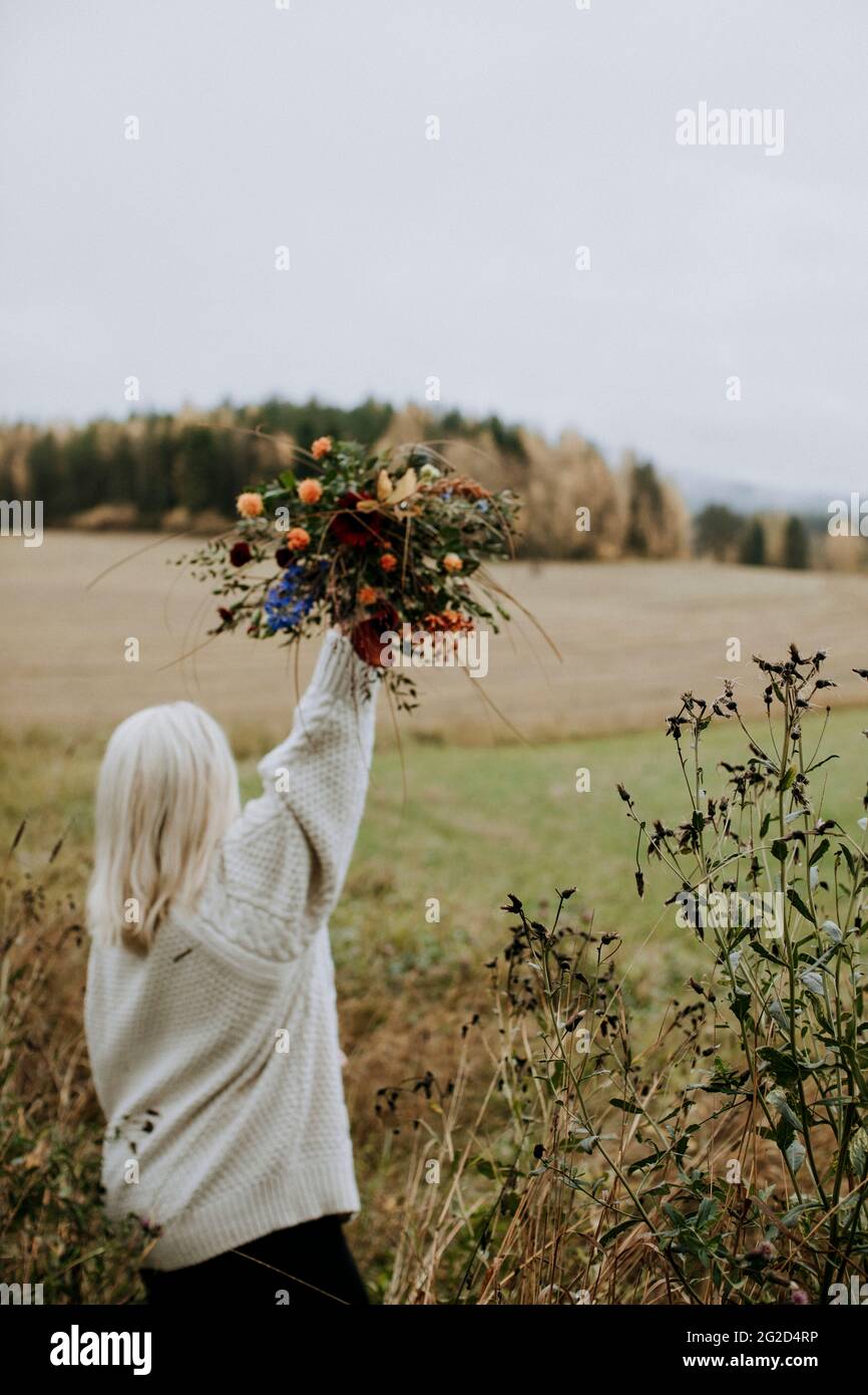 Woman holding aloft hi-res stock photography and images - Alamy