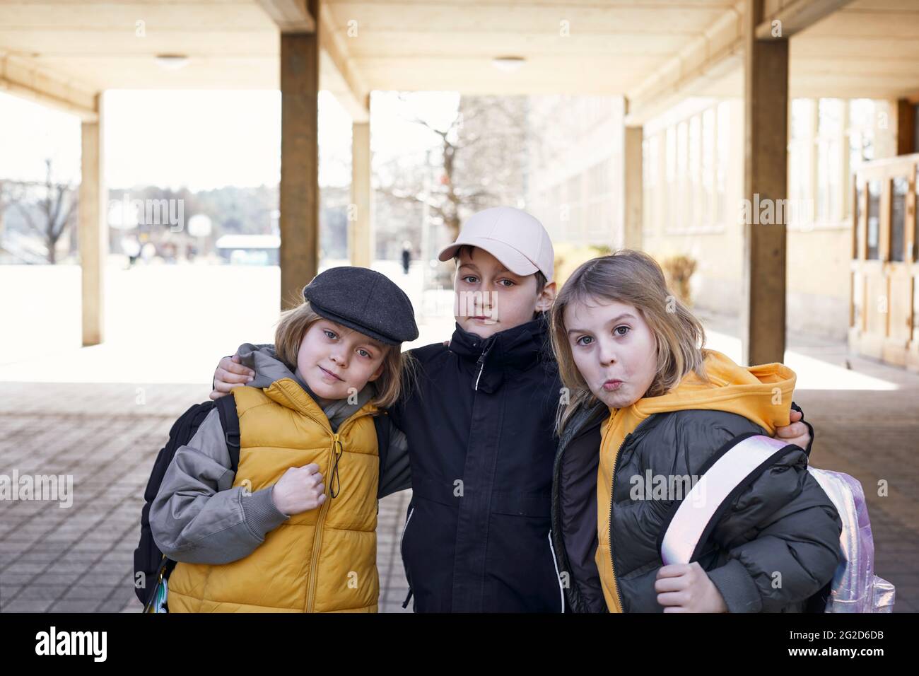 Children standing in front of school Stock Photo - Alamy