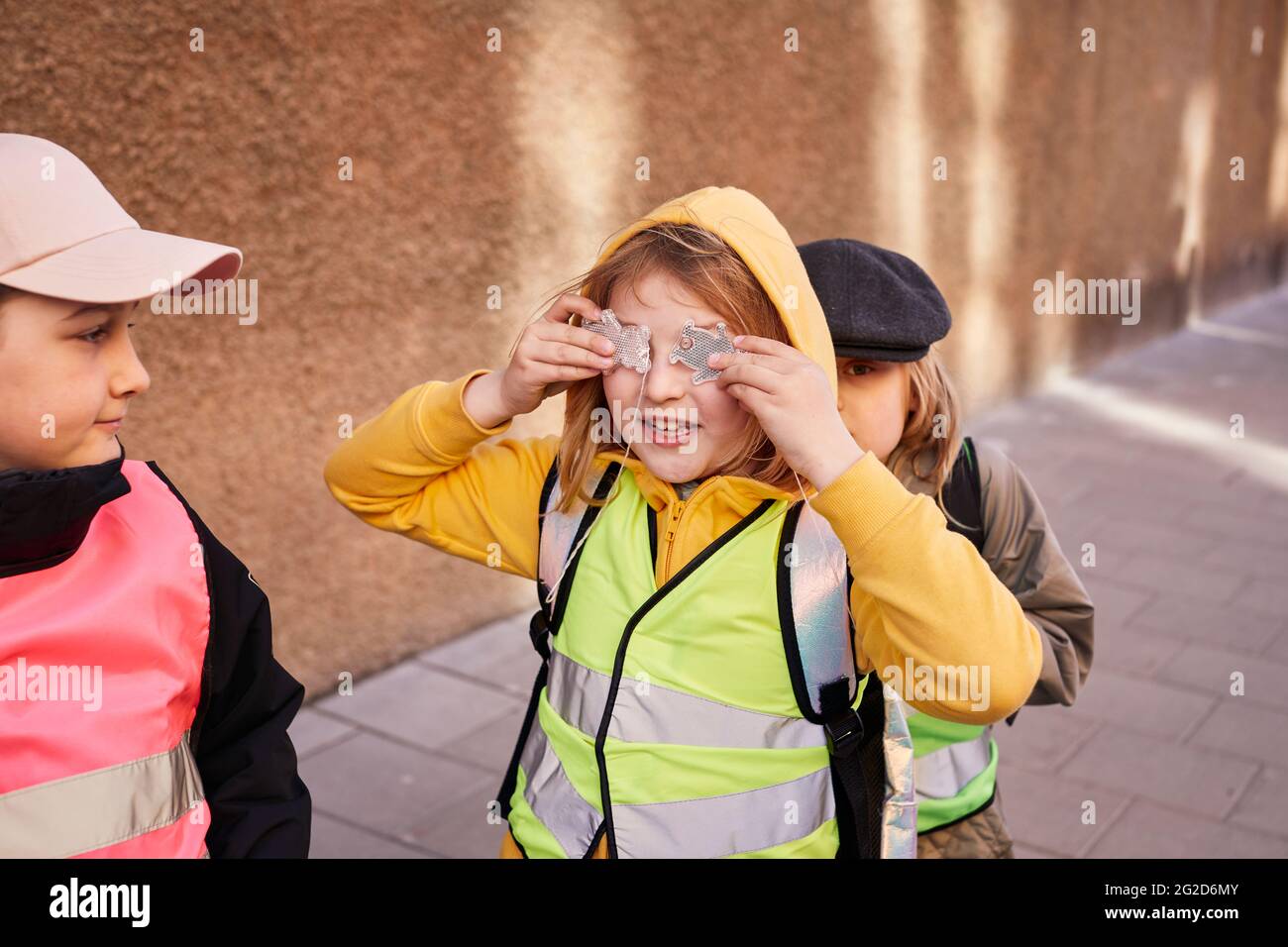 Happy children looking at camera Stock Photo - Alamy