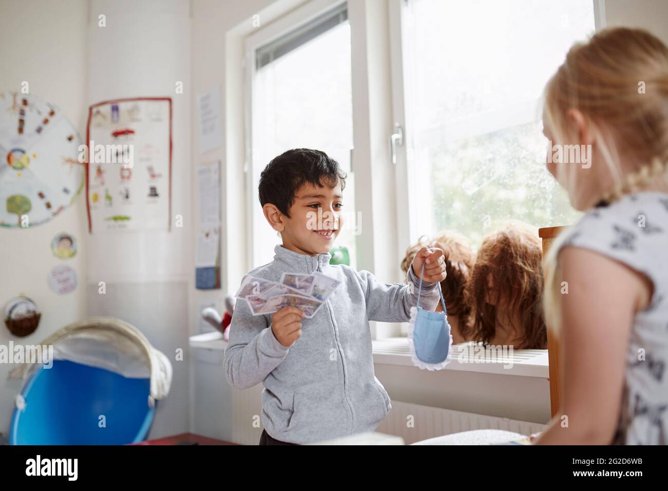 Children playing in classroom Stock Photo - Alamy