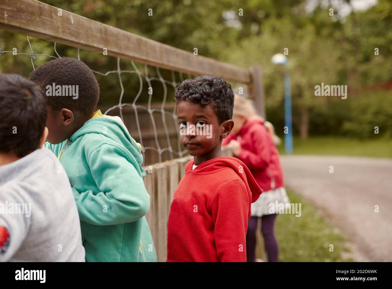 Boy looking at camera Stock Photo - Alamy