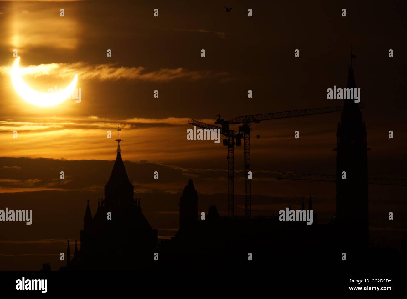 Ottawa, Canada. June 10, 2021: A partial solar eclipse is seen over ...