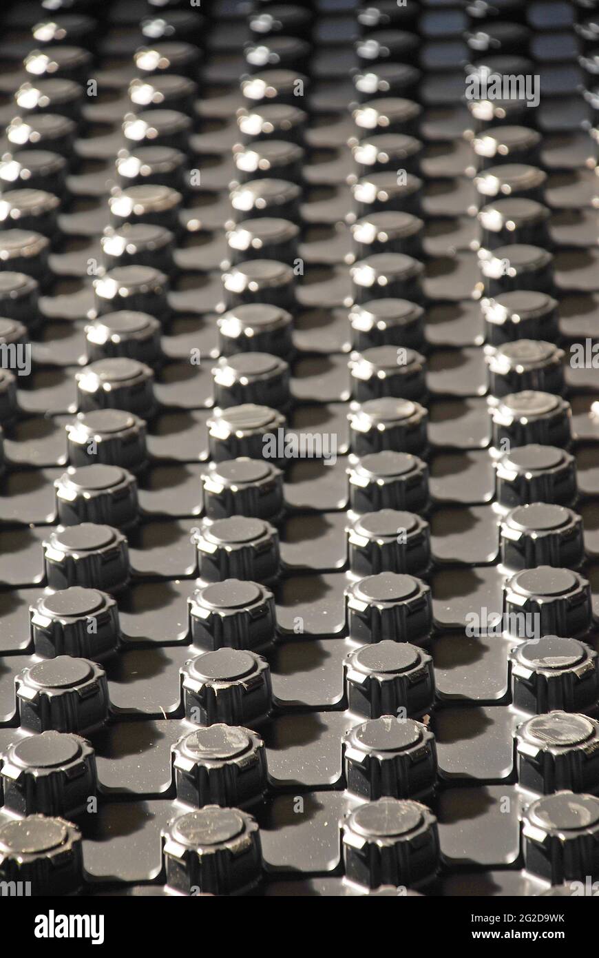 A black plastic molded insulated panel in expanded polystyrene which is ...