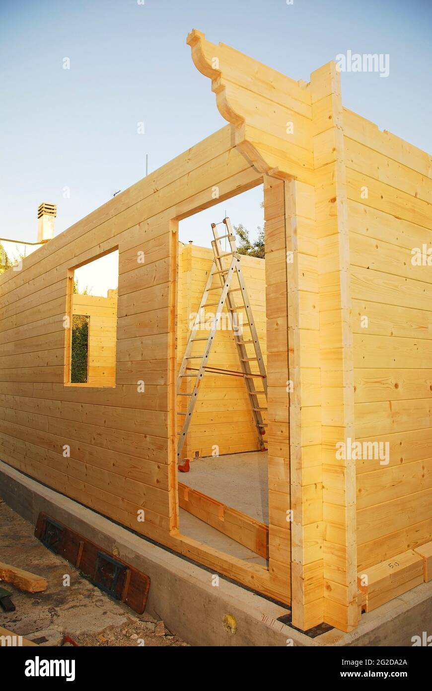 A partially constructed wood (fir) prefabricated block house on a ...