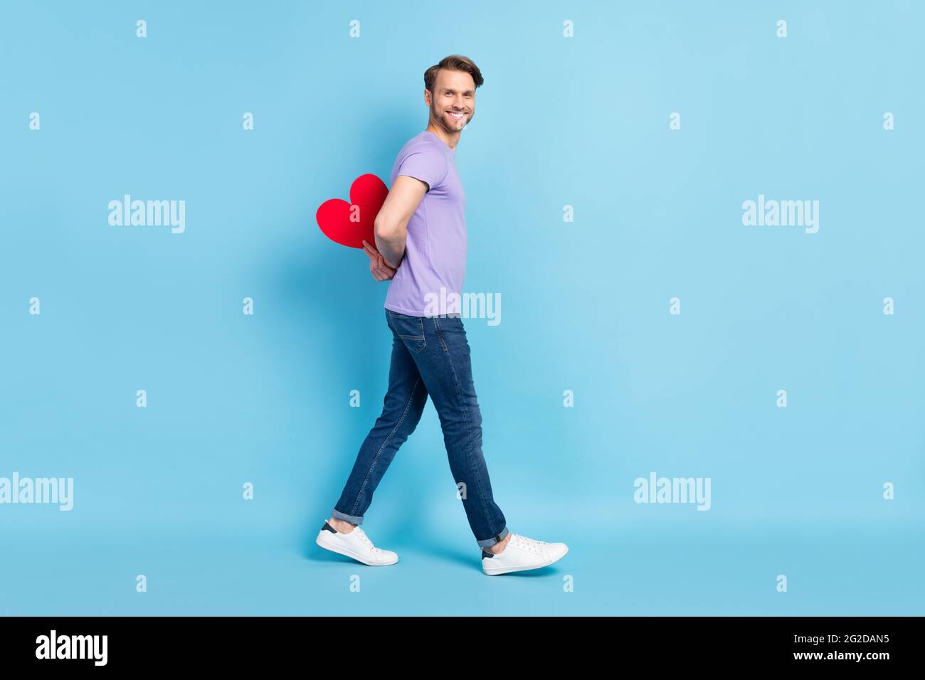Full body profile photo of positive person hands hold paper heart card ...