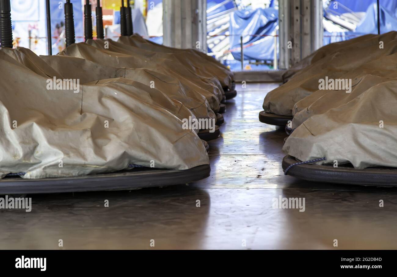 Carousel bumper cars and attractions, fun and fair Stock Photo - Alamy