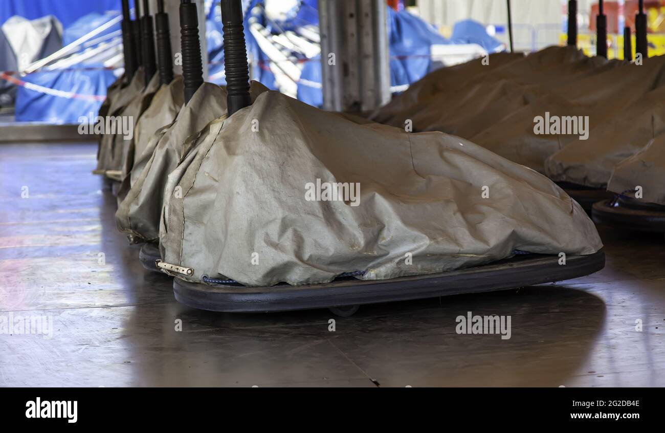 Carousel bumper cars and attractions, fun and fair Stock Photo - Alamy