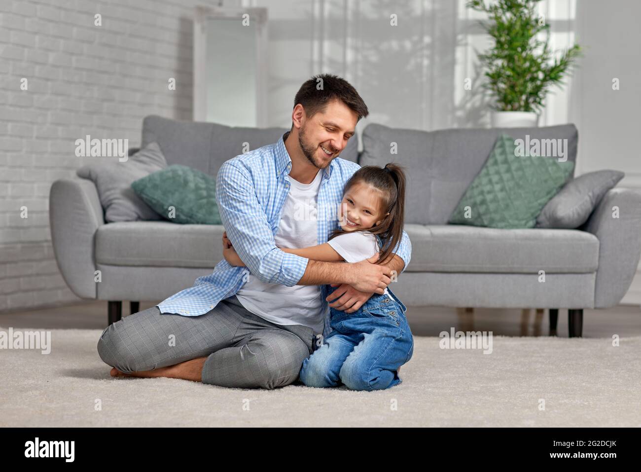 father hugging his cute little child daughter Stock Photo - Alamy