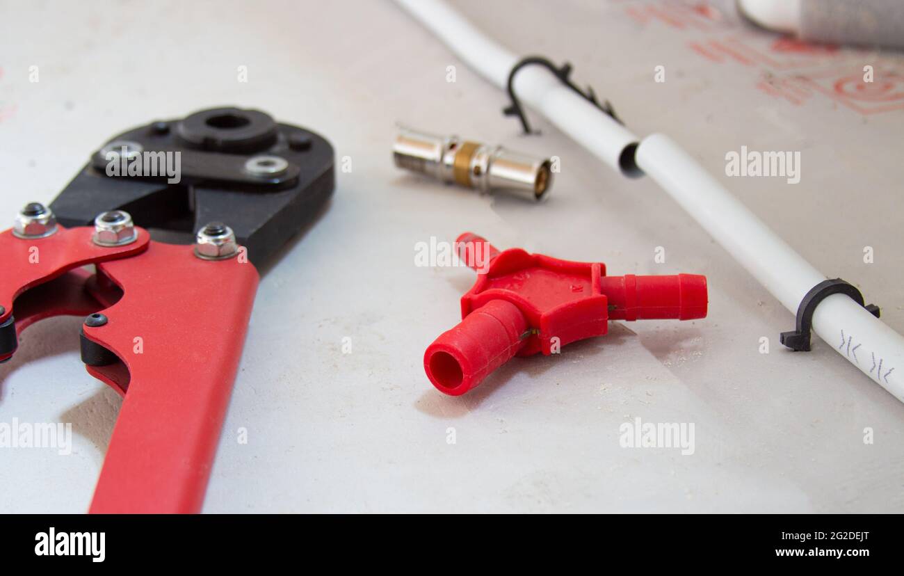 Repair of a broken pipe in the underfloor heating system. Plumbing ...