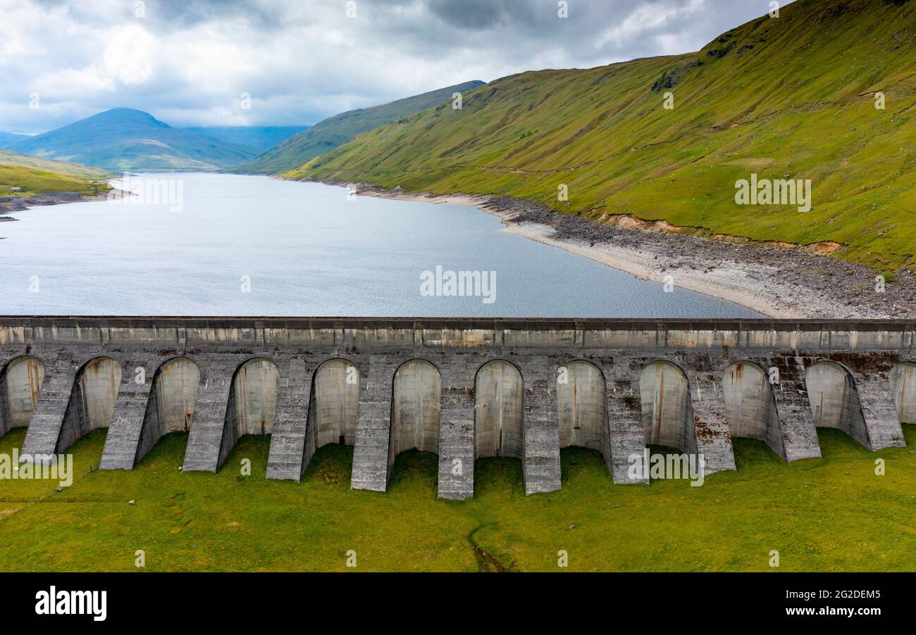 Aerial view from drone of Lubreoch Dam and power station at loch Lyon ...