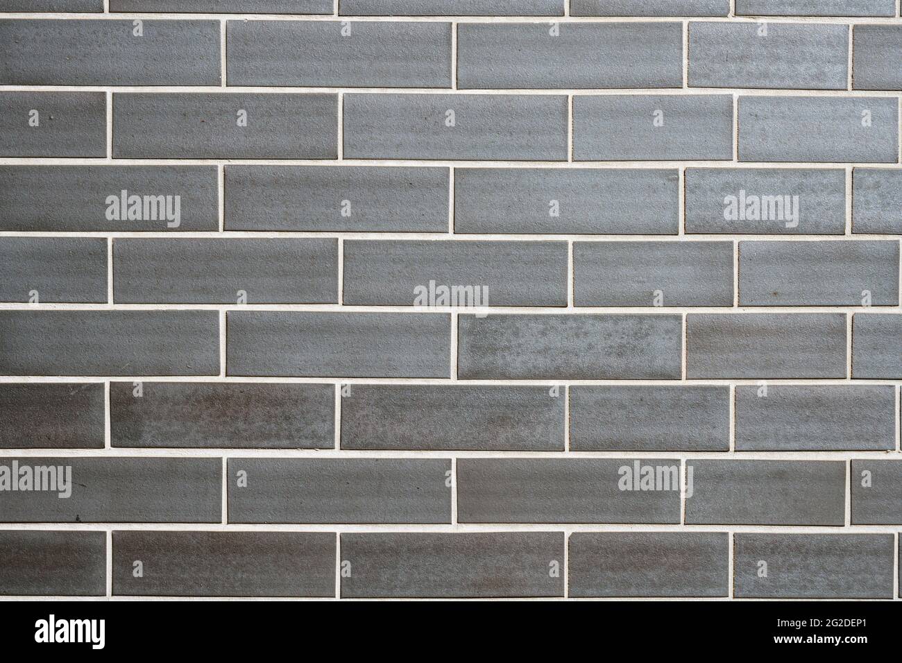 Grey brick background hi-res stock photography and images - Alamy