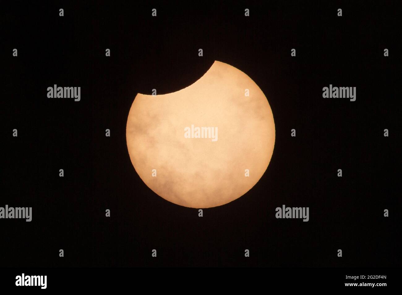 Partial solar eclipse Stock Photo - Alamy