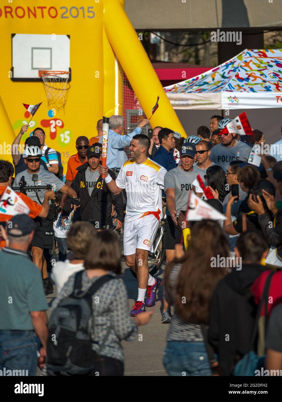 Toronto Raptor Greivis Vazquez carried the torch to the stage during ...