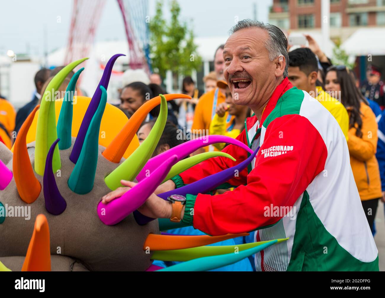 Mexican official having fun with mascot, Pachi the Porcupine at the ...