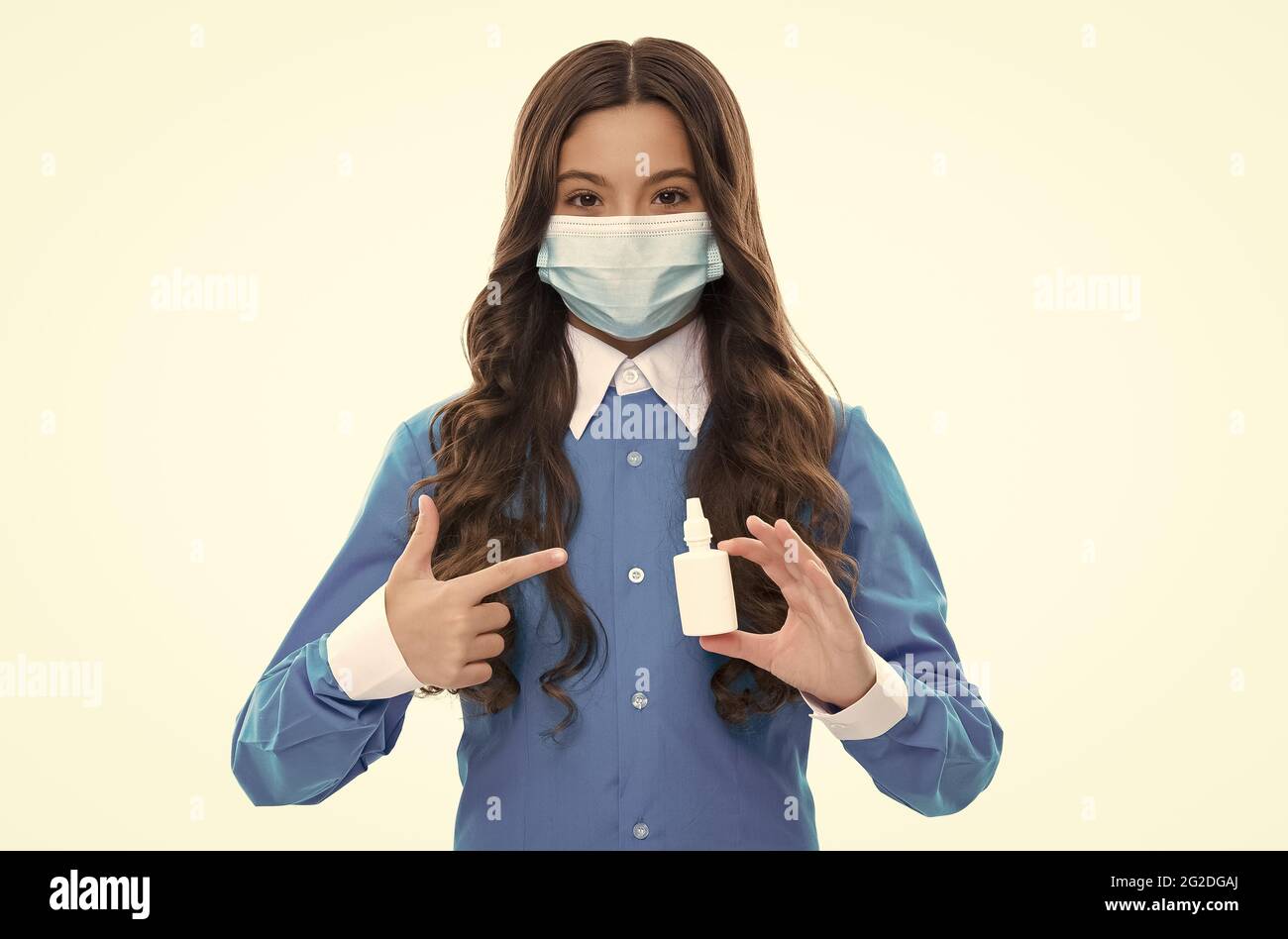 kid in respirator mask with nasal drop or spray for treatment of runny ...