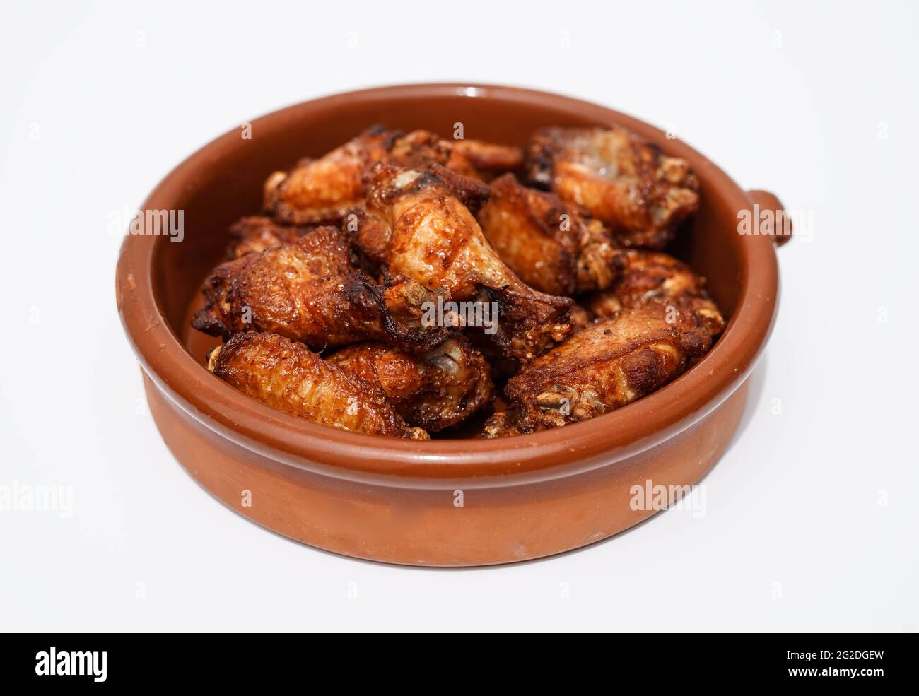 A serving of chicken wings in a tapas bar Stock Photo - Alamy