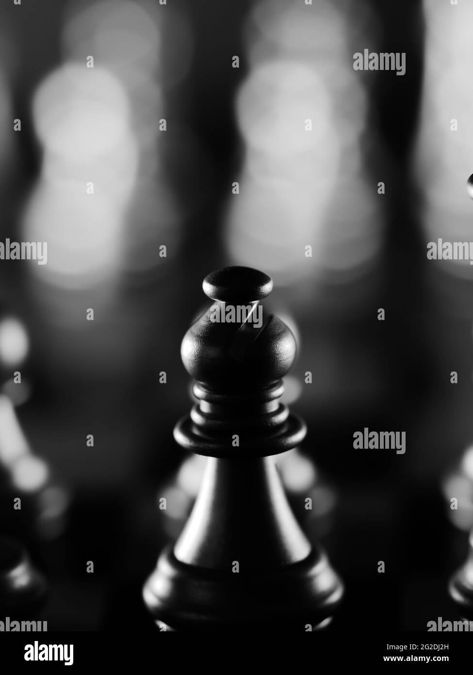 Vertical shot of a chess piece on blurred background Stock Photo - Alamy