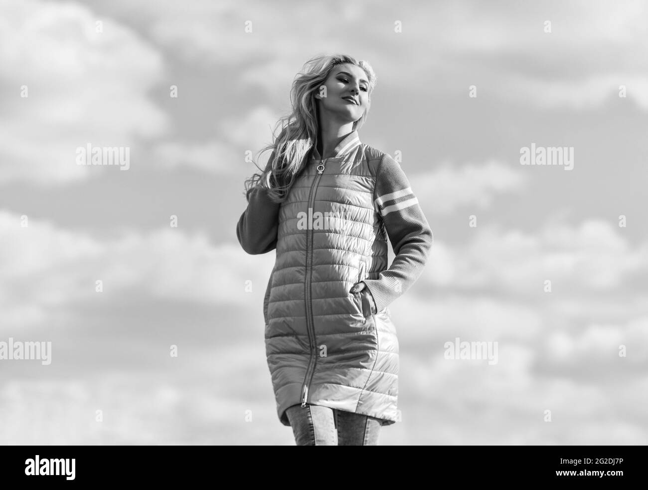 Windy day. Woman enjoying cool weather. Freshness of wind. Matching ...