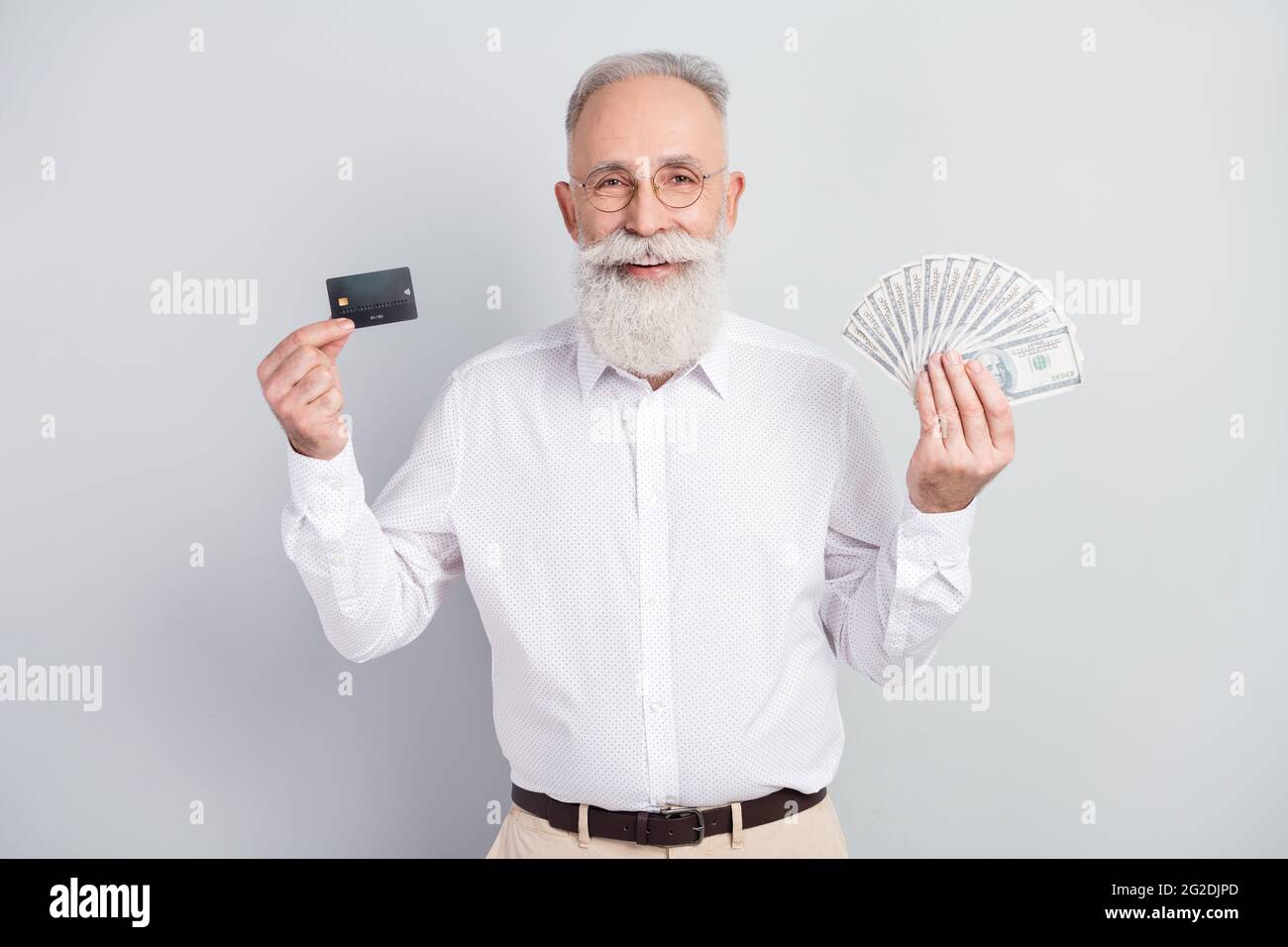 Photo of bearded pensioner retired old man wear white shirt hold credit ...