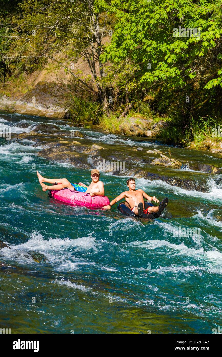 Two men tubing on river hi-res stock photography and images - Alamy
