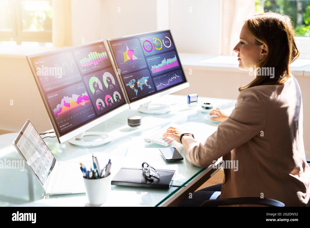 Analyst Woman Looking At Business Data Analytics Dashboard Stock Photo ...