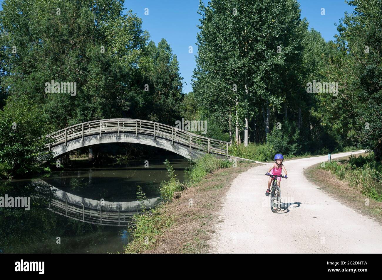 A family cycle through nature in rural france and explore the landscape ...