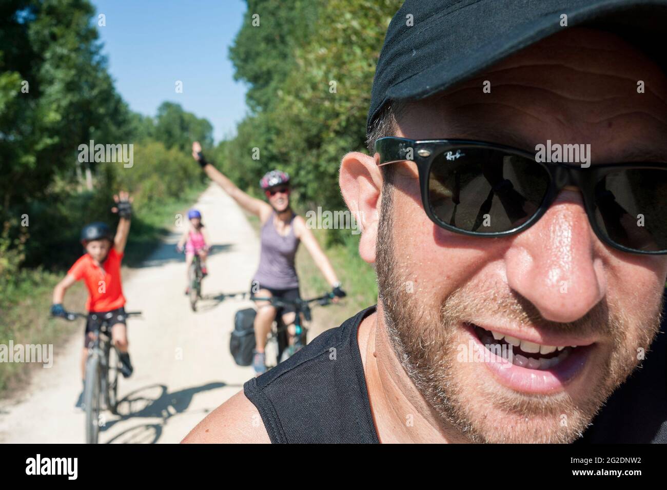 A family cycle through nature in rural france and explore the landscape ...