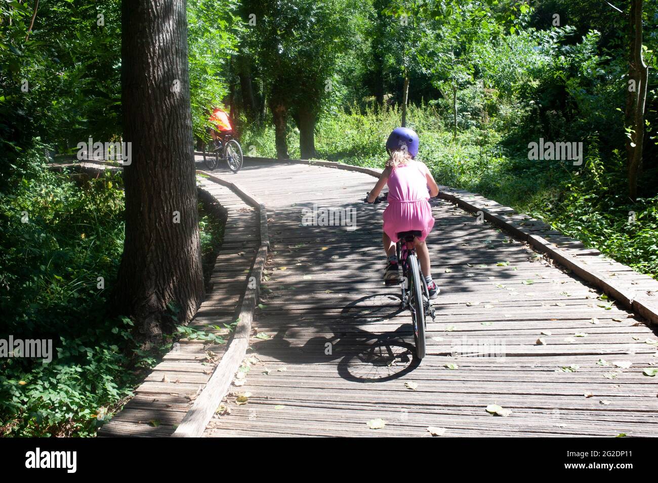 A family cycle through nature in rural france and explore the landscape ...