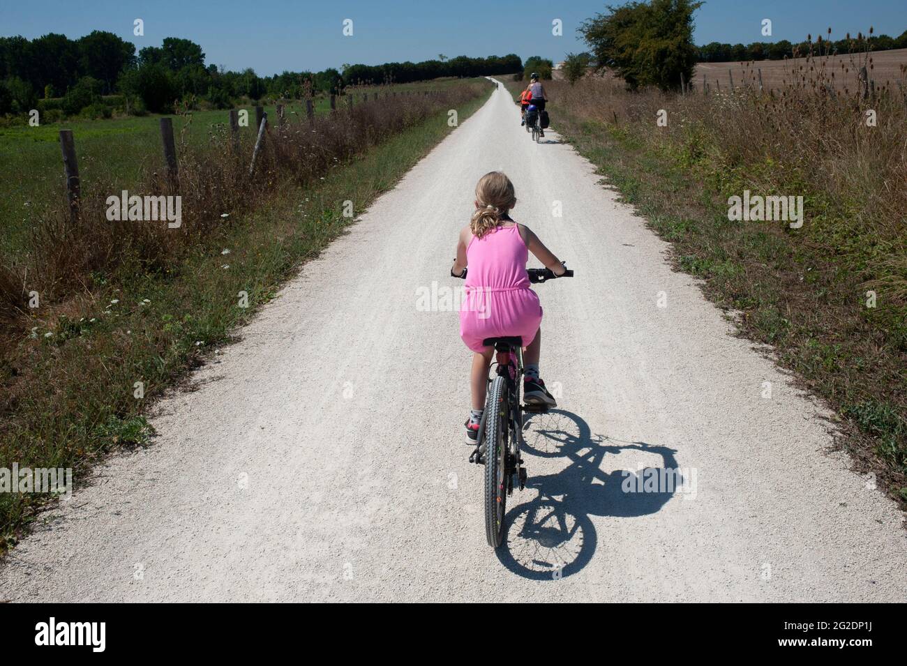 A family cycle through nature in rural france and explore the landscape ...