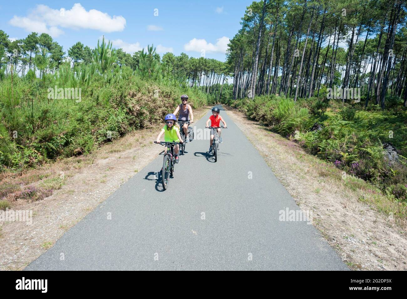 A family cycle through nature in rural france and explore the landscape ...
