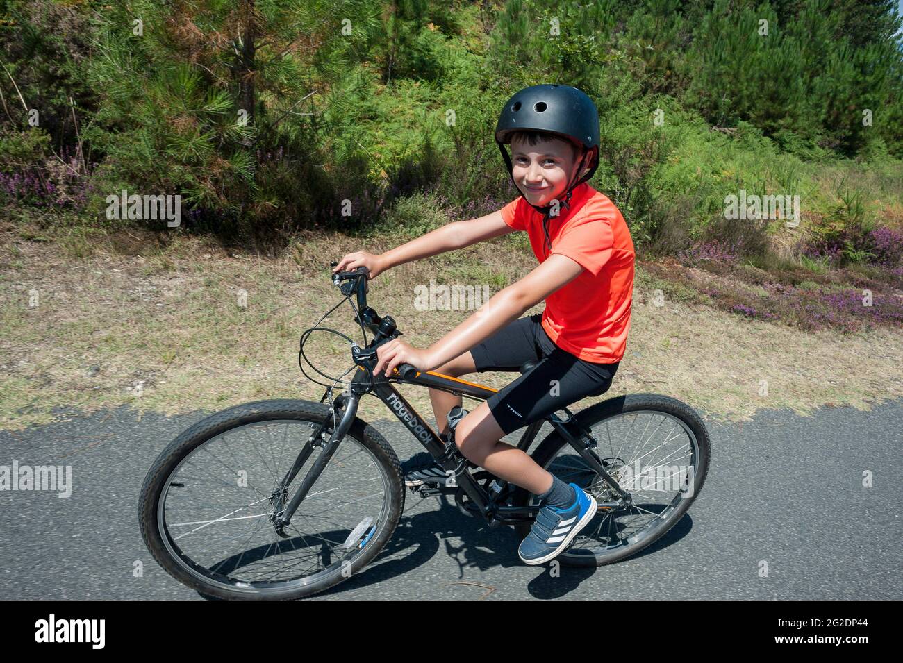 A family cycle through nature in rural france and explore the landscape ...